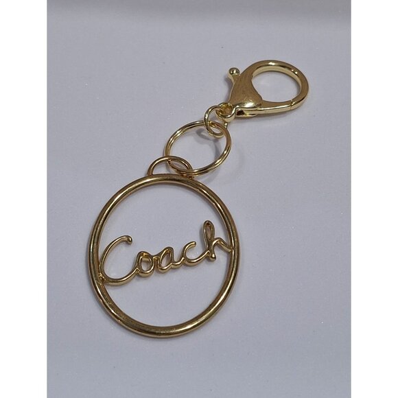 Coach | Accessories | Euc Coach Goldtone Script Logo Circle Keychain ...